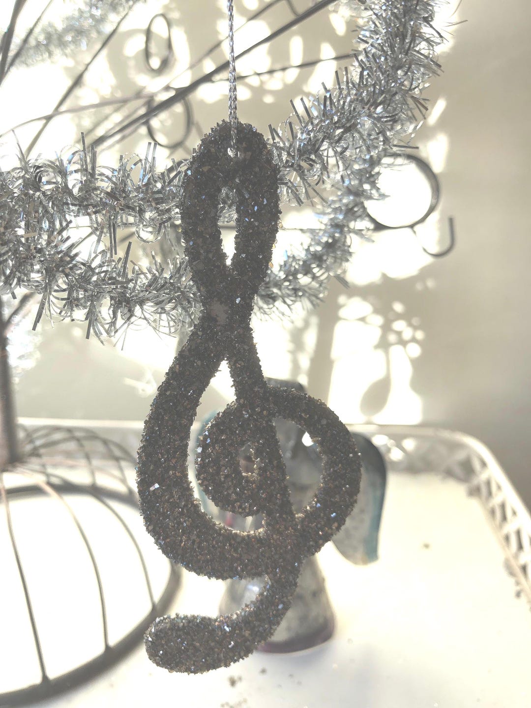 Glittery Treble Clef From a Set of Christmas Decorations With a Music ...