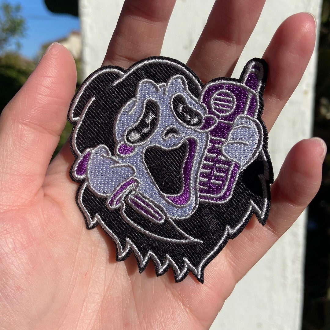 The Scream Movie Inspired Laughing Ghostface Killah With Purple Phone ...