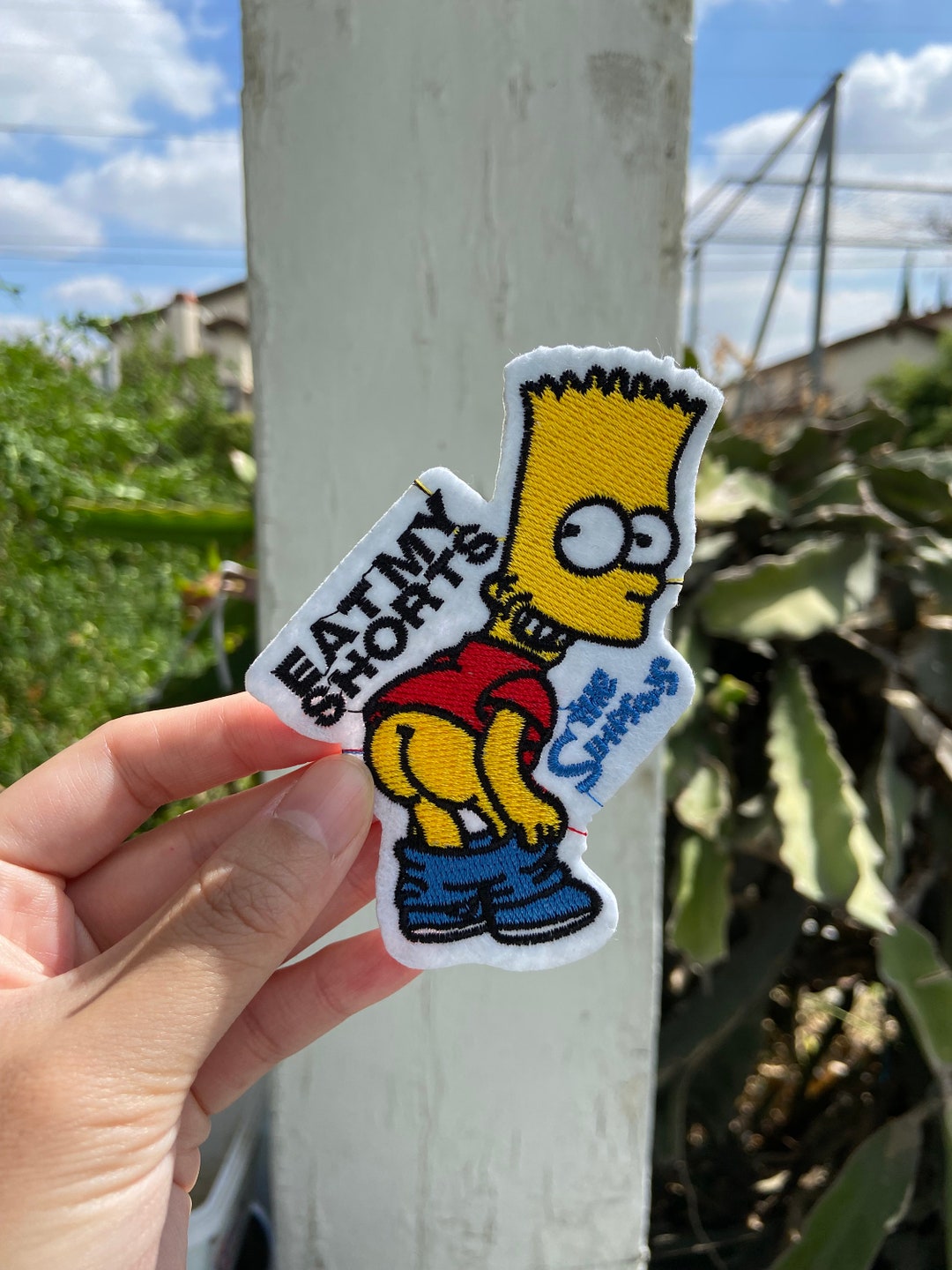 The Simpson Family Inspired Yellow Boy Bart Simpson Saying “eat My ...