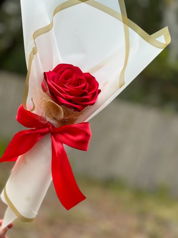 Single Red Rose In Cellophane