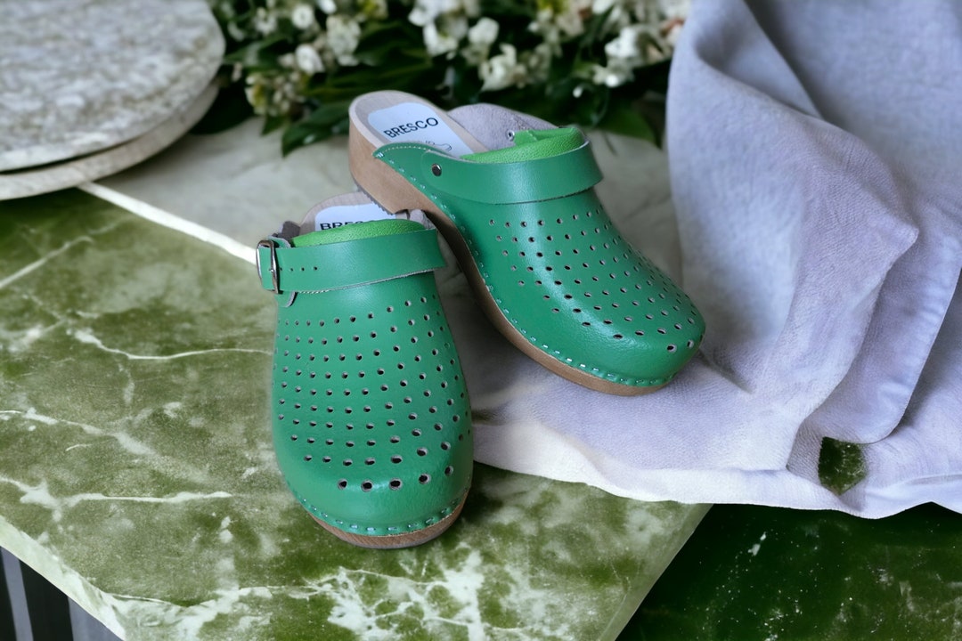 Wooden Clogs With Perforated Leather in Green and Soft Foam on the ...