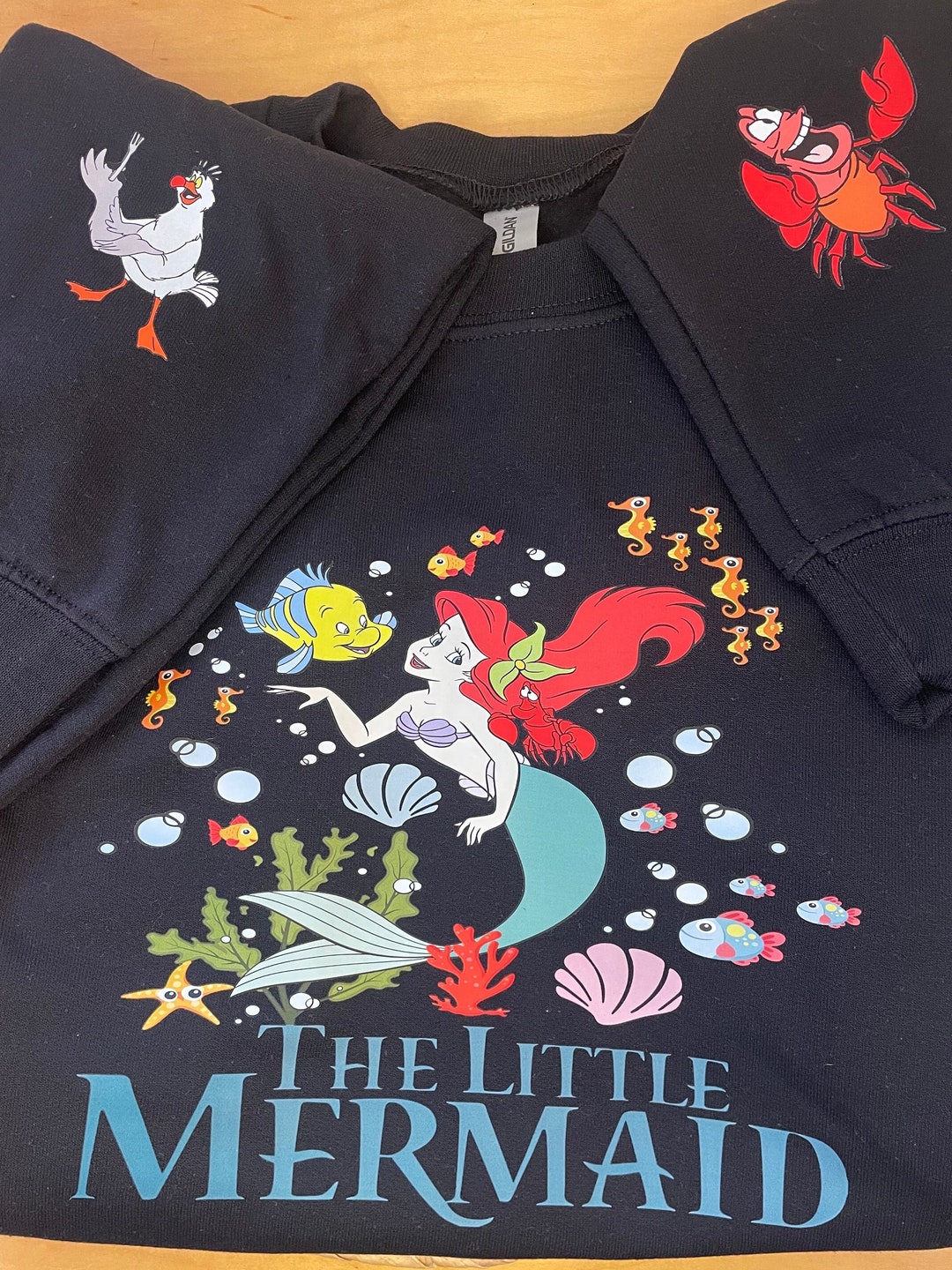 The Little Mermaid Sweater: Sebastian & Scuttle Sleeves, Black Pullover ...