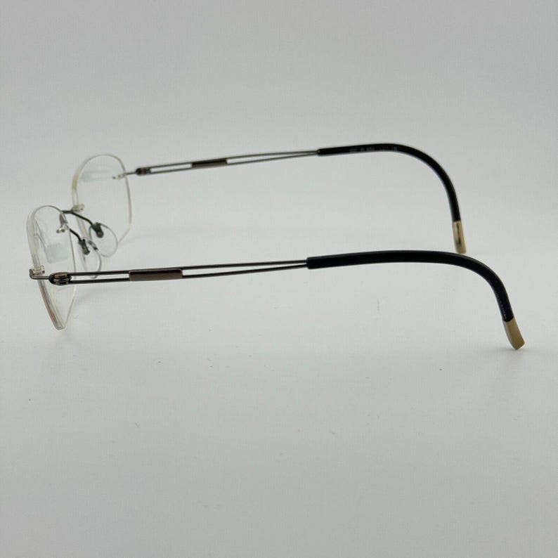 Silhouette 4302 40 6052 5227 Titanium Brown Rimless Eyeglasses Frames ...