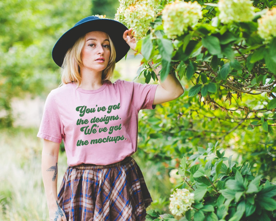 Mauve Tee Shirt Mockup: Photograph of Model Wearing Hat and Bella ...