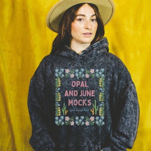 Mockup of Mineral Black Hoodie: Photo of Model Wearing Colortone 8300 ...