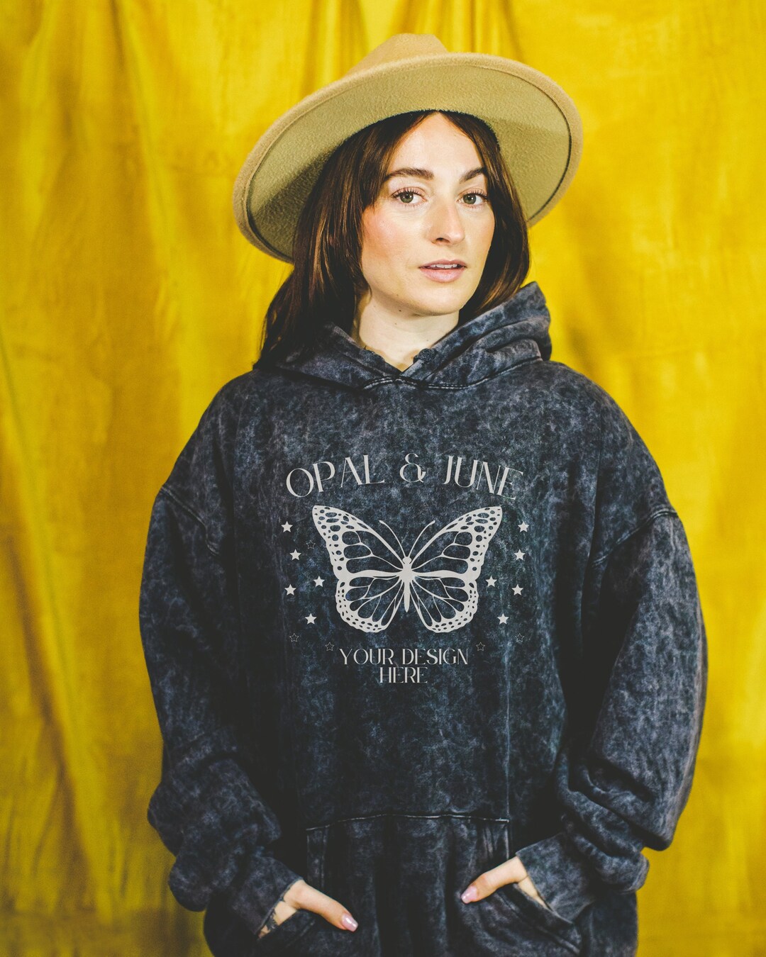 Mockup of Mineral Black Hoodie: Photo of Model Wearing Colortone 8300 ...