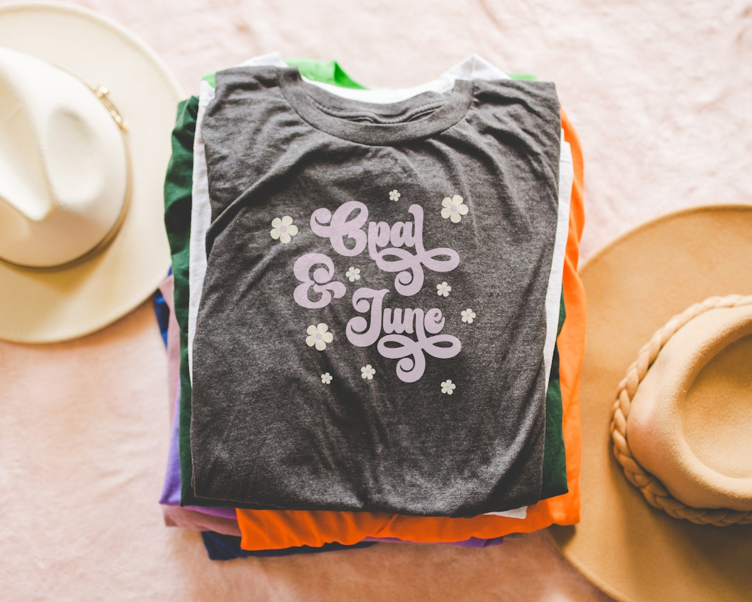 Dark Grey Heather Tee Shirt Mockup: Colorful Photo of Folded Dark Gray ...