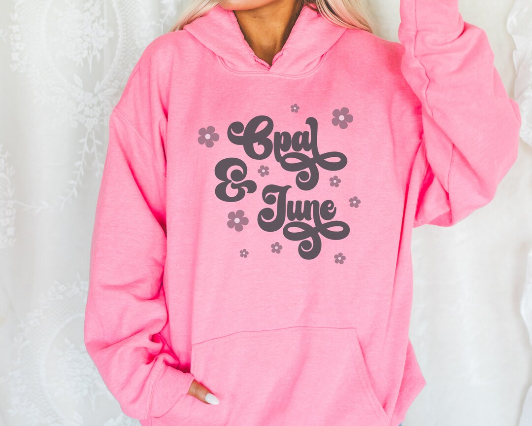Safety Pink Hoodie Mockup: Colorful Photo of Model Wearing Safety Pink ...