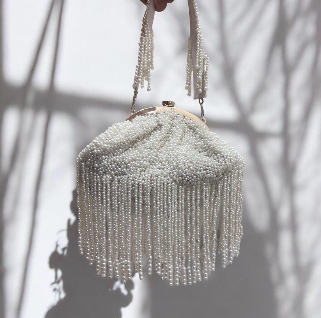 Ivory Breeze: Intricately Beaded Bridal Potli Bag | Wedding Day Bag ...