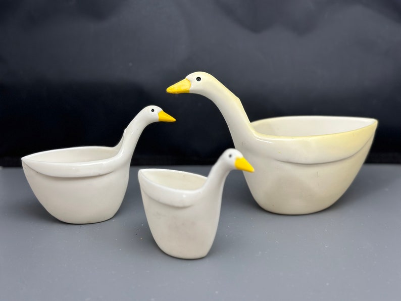 Vintage Stacking Geese Measuring Cups. There is the 1/4 Cup, 1/3 Cup ...
