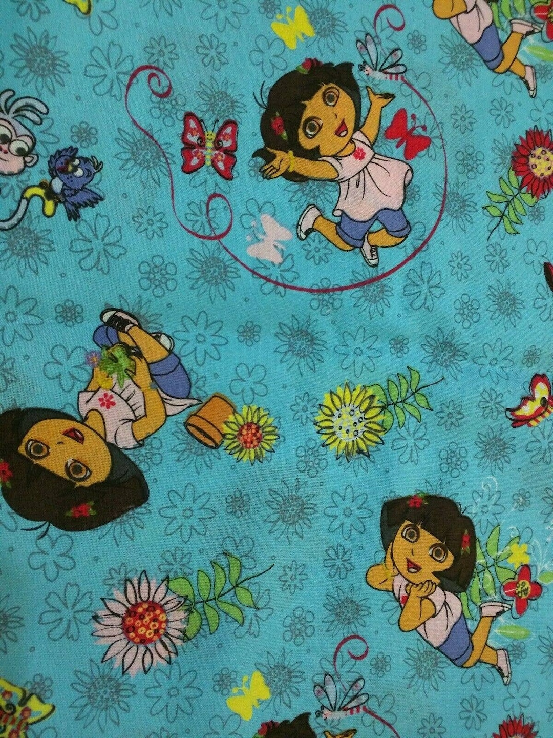 Dora the Explorer Goes Digging Planting Flowers Garden Cotton Fabric ...