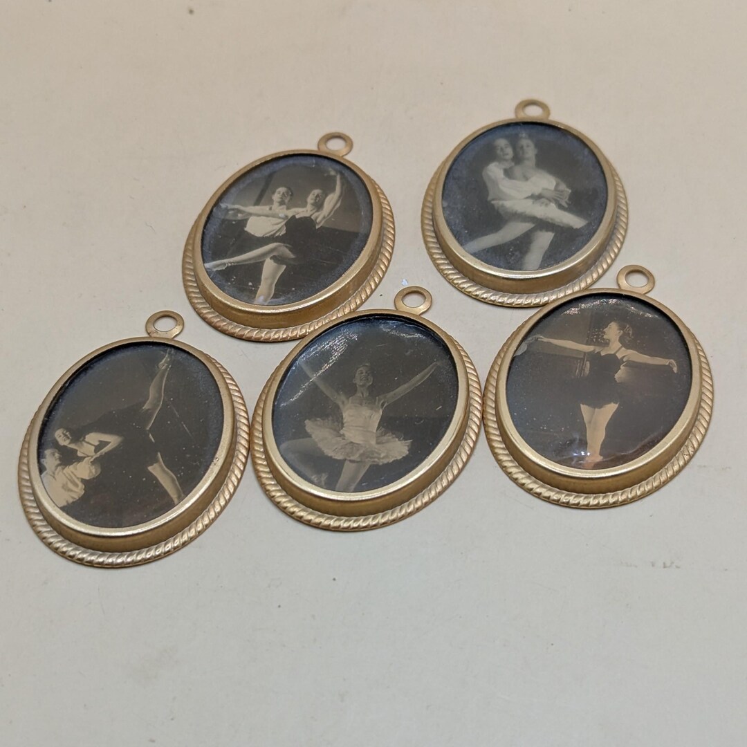 Five Small Thin Metal Frames With Pictures of Dancers With Transparent ...