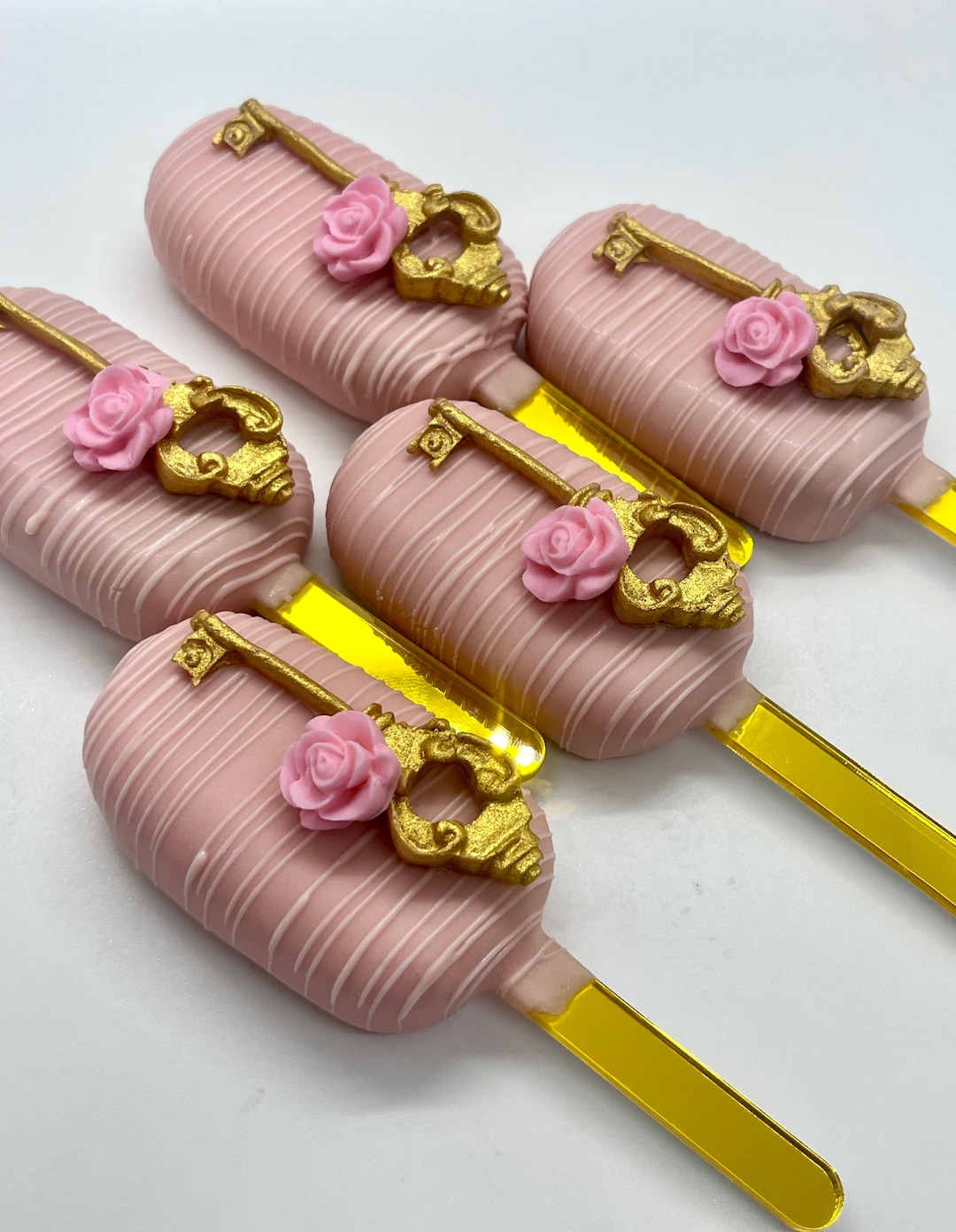 Alice in Wonderland Theme Floral Cakesicles for Birthday Party Dessert ...