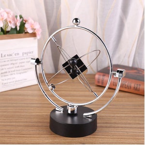 Newton Pendulum Rotating Ball - Etsy