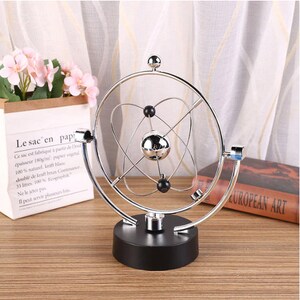 Newton Pendulum Rotating Ball - Etsy