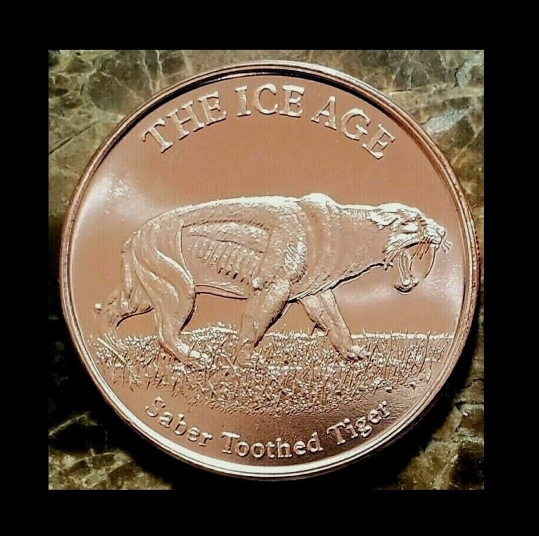 The Ice Age Saber Toothed Tiger 1oz. Pure Copper Round!! - Etsy