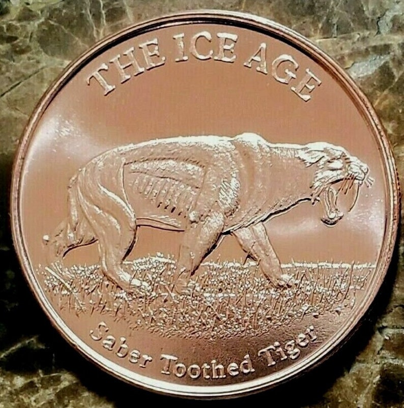 The Ice Age Saber Toothed Tiger 1oz. Pure Copper Round!! - Etsy