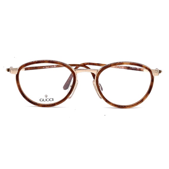 Gucci round dbl rimmed tortoise/ gold metal frames, h… - Gem