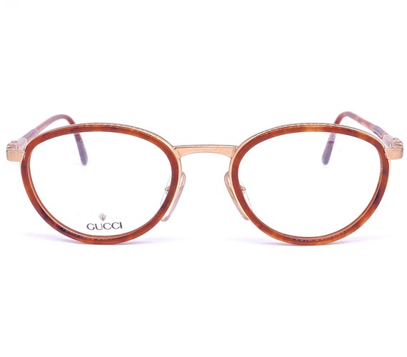 Gucci round dbl rimmed tortoise/ gold metal frames, h… - Gem