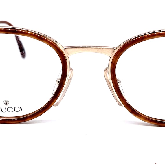 Gucci round dbl rimmed tortoise/ gold metal frames, h… - Gem