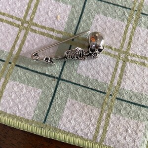 PINNED by a SKELETON - Etsy