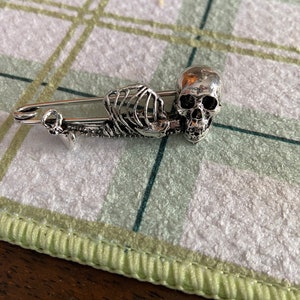 PINNED by a SKELETON - Etsy