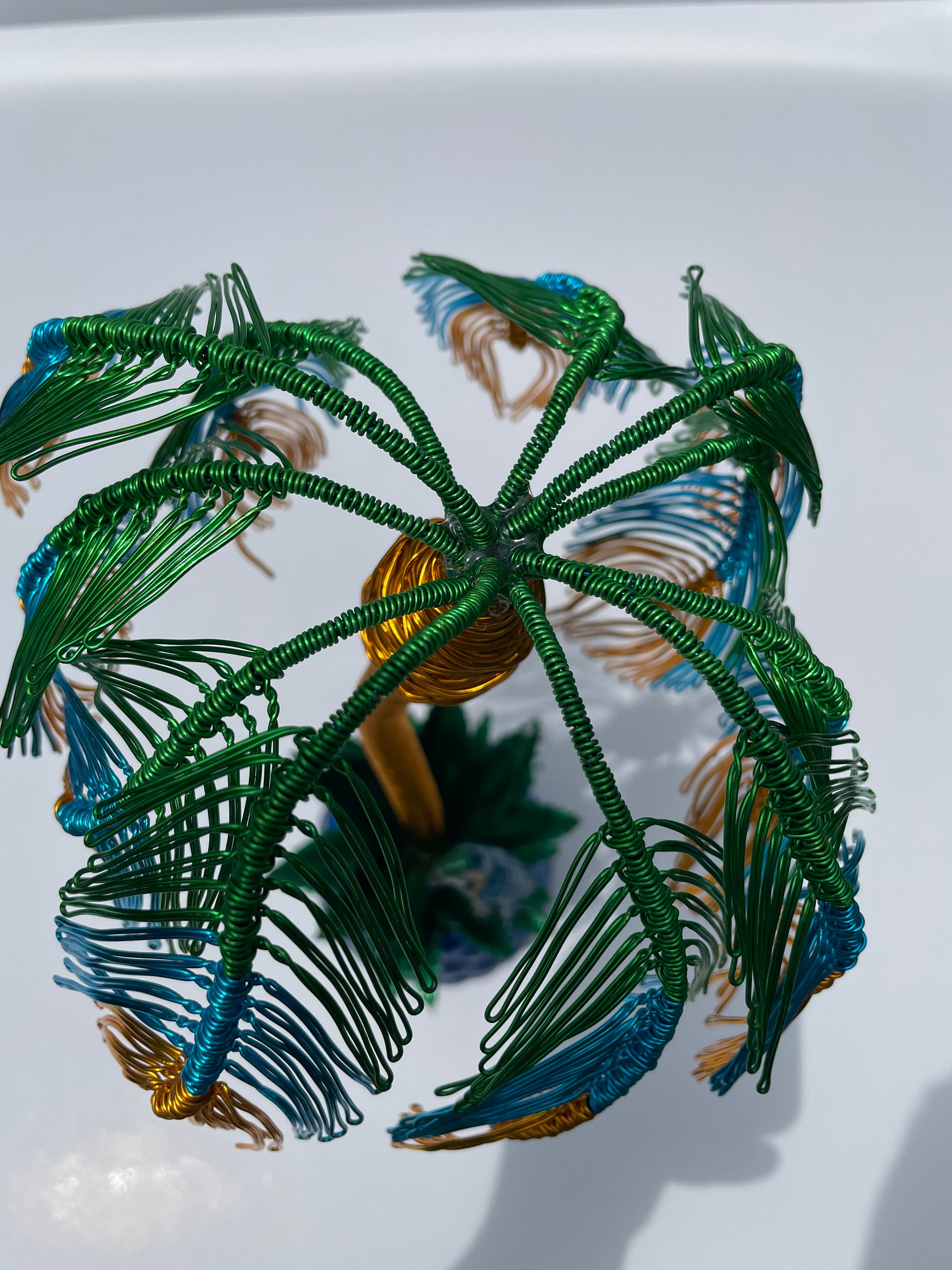 This is a Wire Palm Tree That Sits on a Porcelain Pineapple. This is a ...