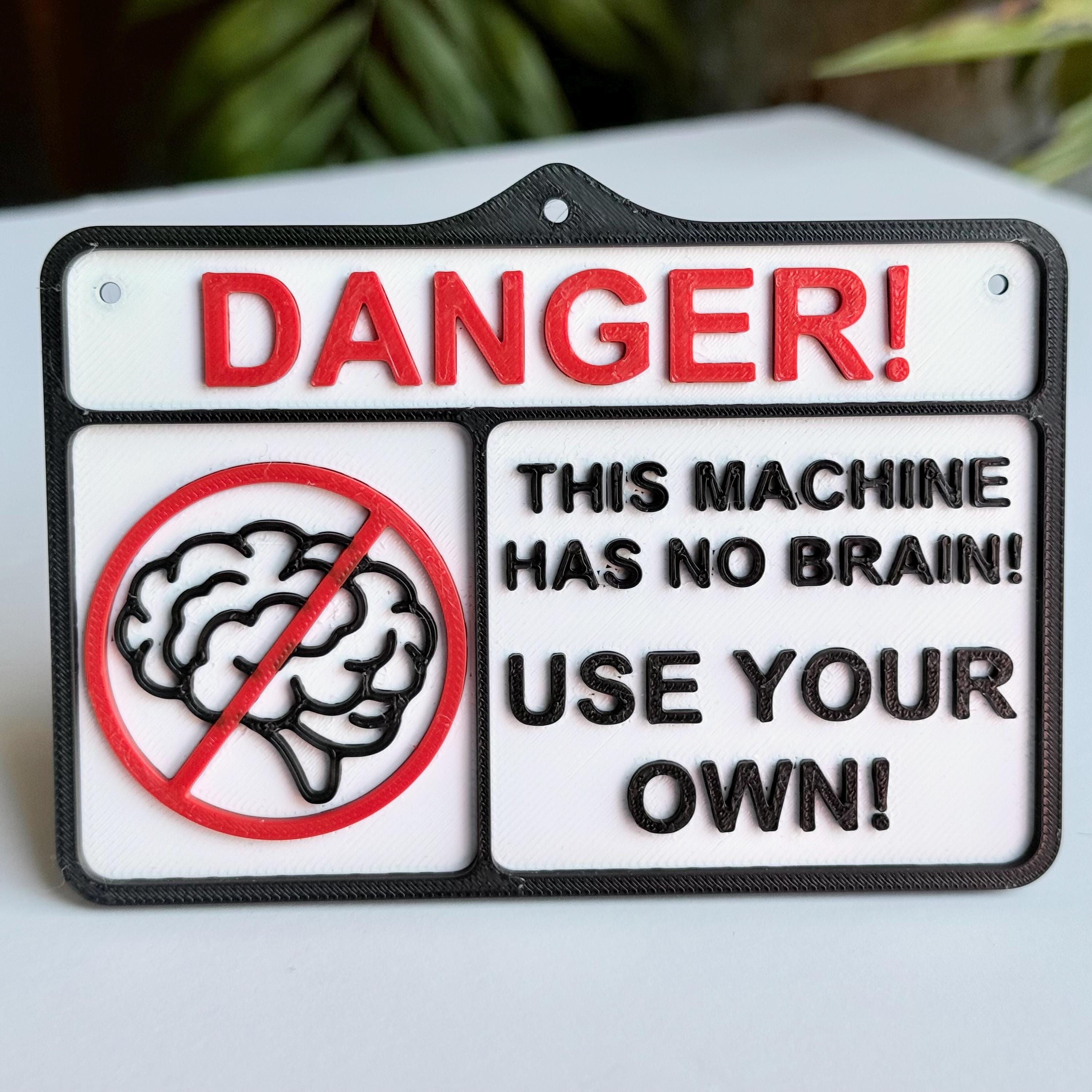 Funny Warning Sign: 'this Machine Has No Brain! Use Your Own!' Caution ...