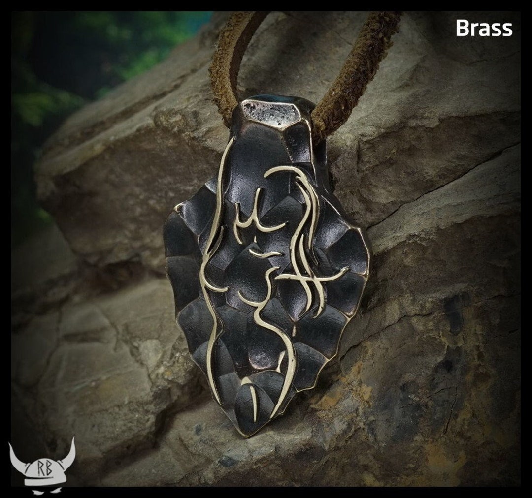 Symbolic Pendant Sculpted From Metal Human Instinct Man Bull Woman ...