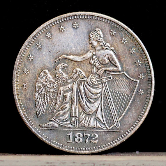 Seated Liberty Dollar