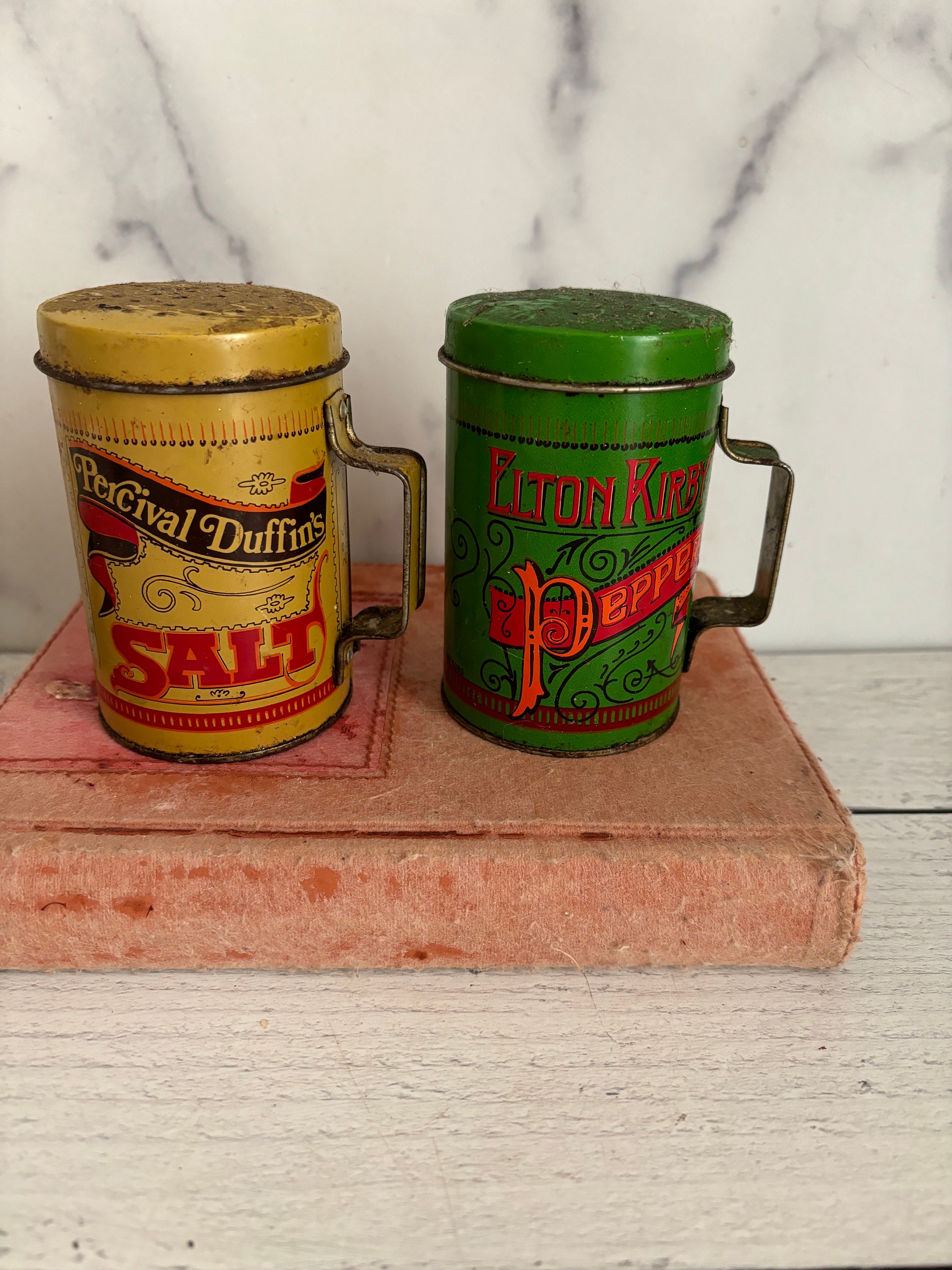 Tin salt and pepper shakers store