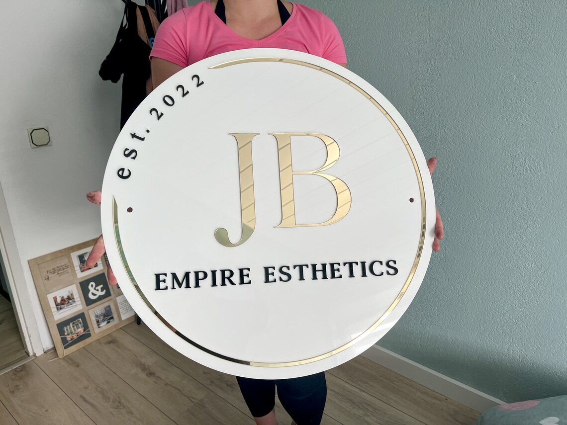 Circle Acrylic Wall Sign on White Background, Gold and Black Lettering ...