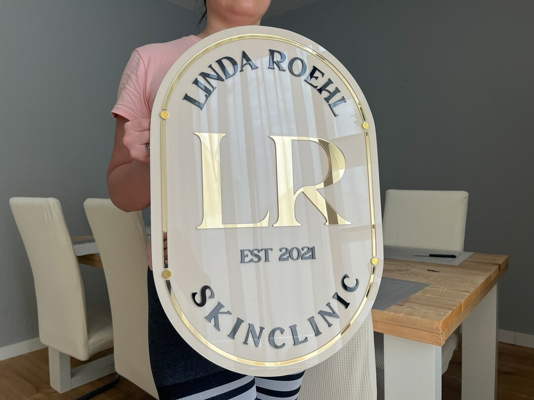 Beige Oval Sign With Golden and Black Letters, Golden Lining, Mounting ...