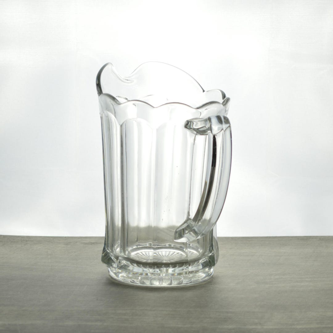Vintage Clear Glass Pitcher With Ribbed Design and Starburst Base - 9 ...