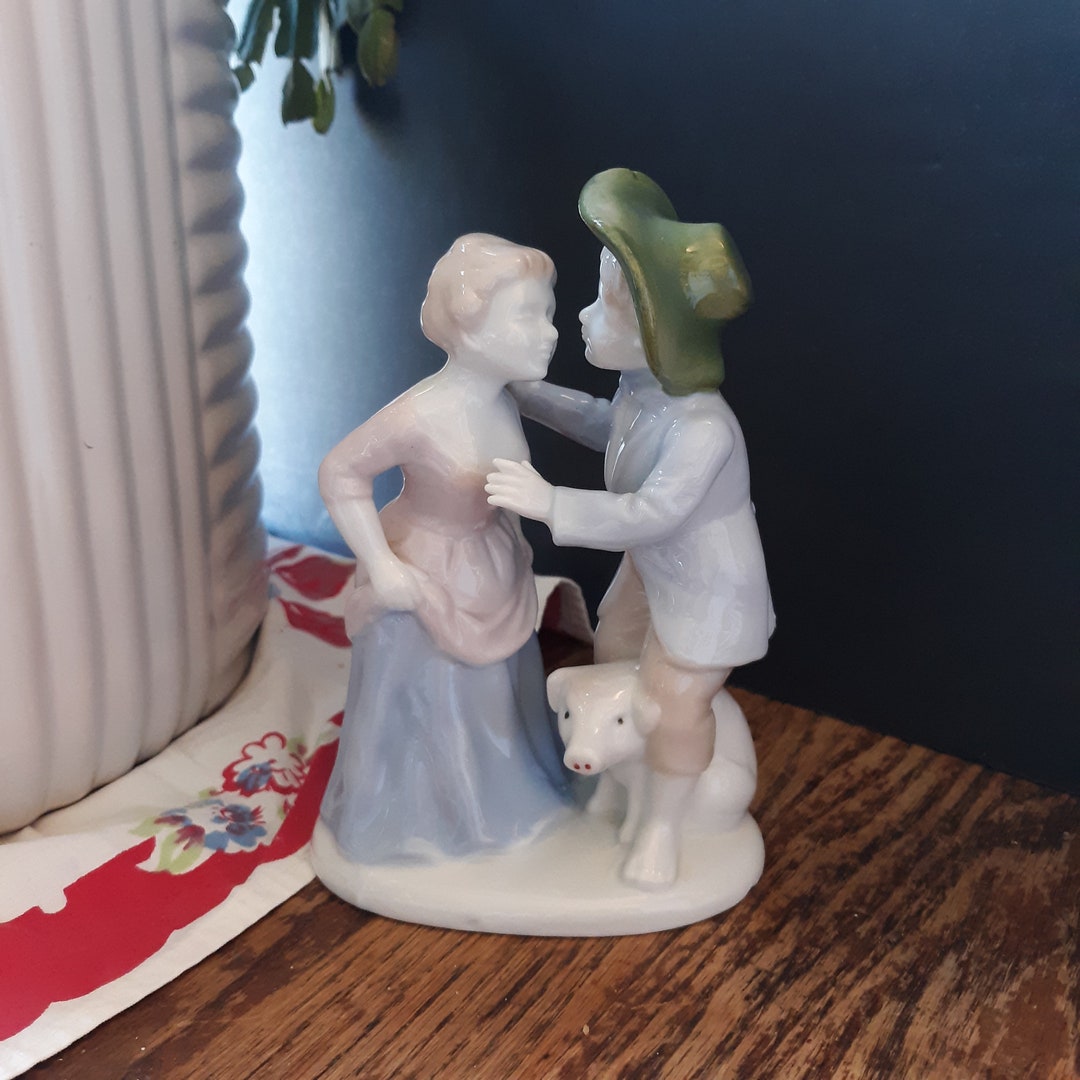 Vintage Fine Porcelain Ware Figurine of Boy and Girl and a Little Pig ...