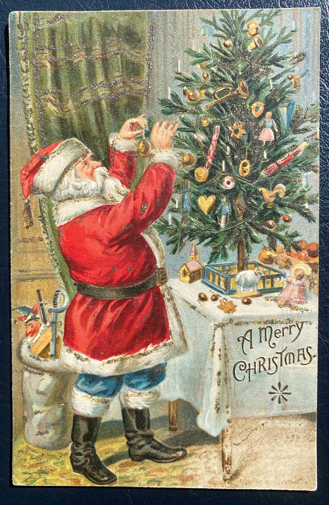 GC Rare Vintage 1908 Christmas Postcard Santa Hand Ornament on Tree Real Glitter Textured ...