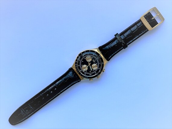 Swatch Irony Chrono GOLDFINGER YCG401, James Bond, ne… - Gem