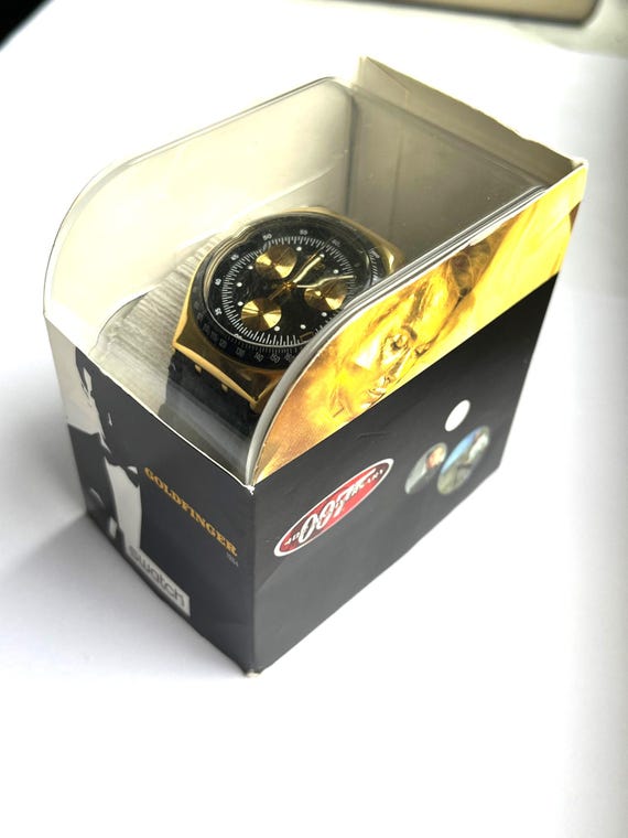 Swatch Irony Chrono GOLDFINGER YCG401, James Bond, ne… - Gem