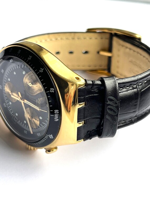 Swatch Irony Chrono GOLDFINGER YCG401, James Bond, ne… - Gem