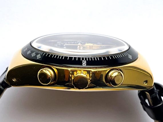 Swatch Irony Chrono GOLDFINGER YCG401, James Bond, ne… - Gem