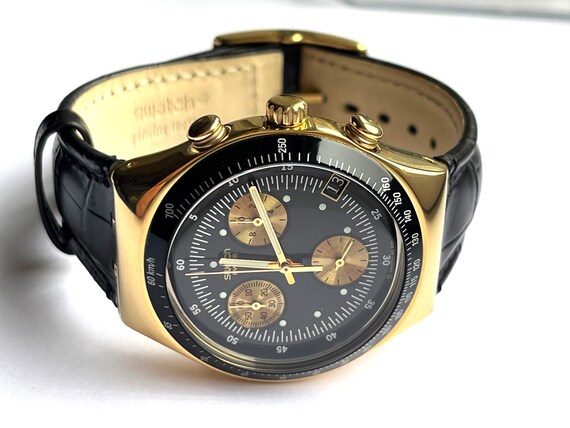 Swatch Irony Chrono GOLDFINGER YCG401, James Bond, ne… - Gem