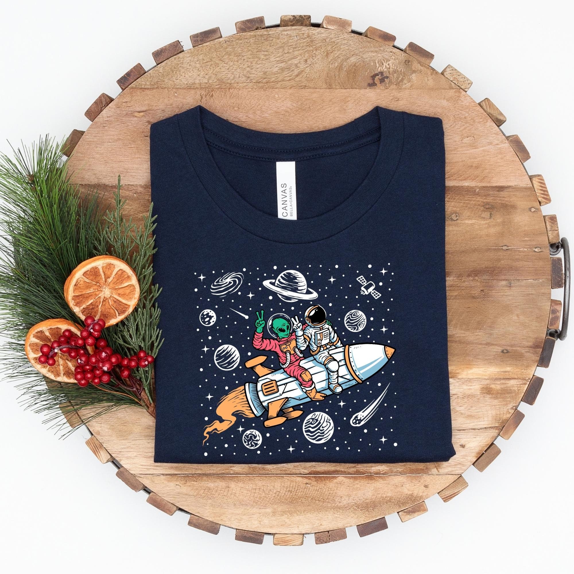 Astronaut & Alien Riding A Rocket Graphic T-shirt Funny Space Shirt ...