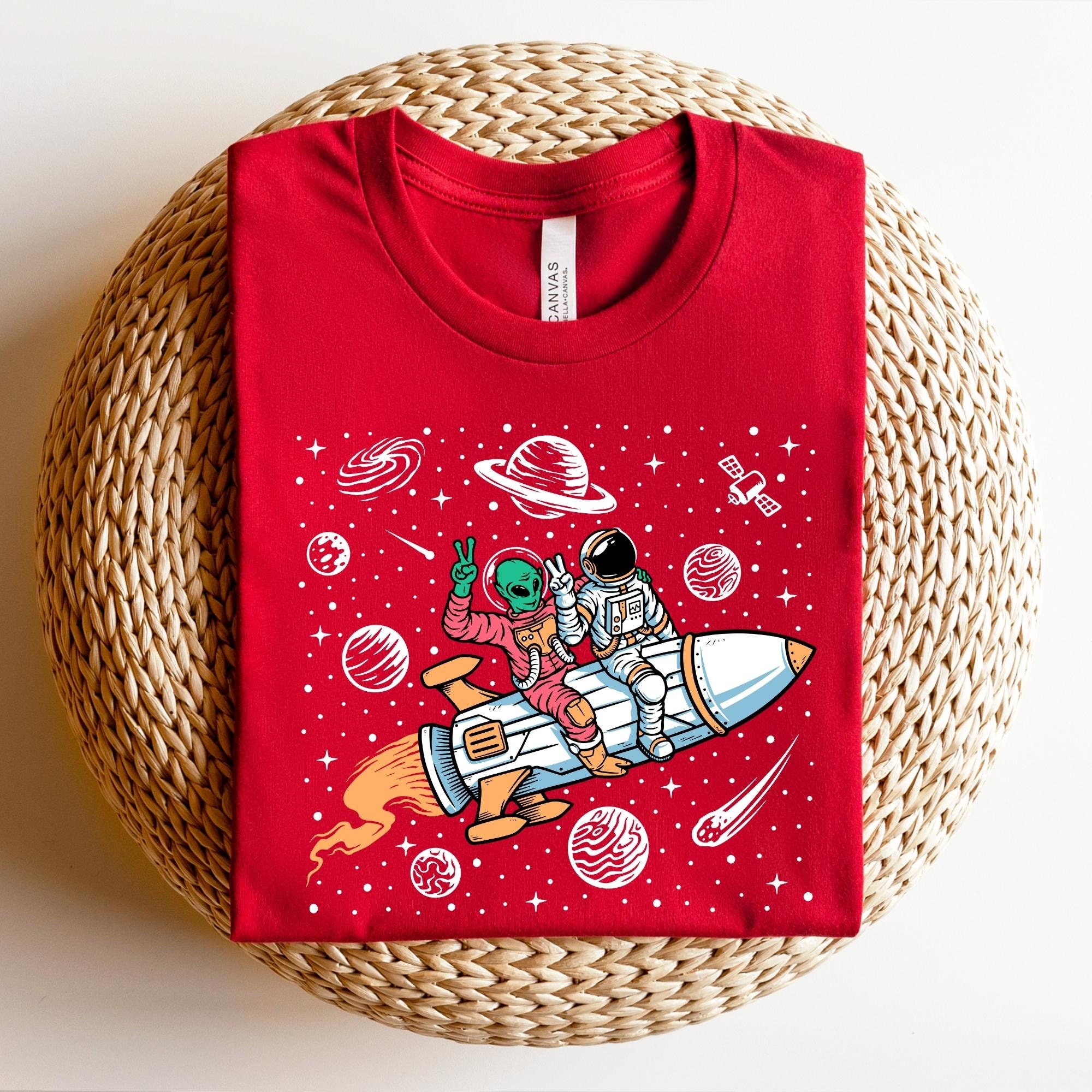Astronaut & Alien Riding A Rocket Graphic T-shirt Funny Space Shirt ...