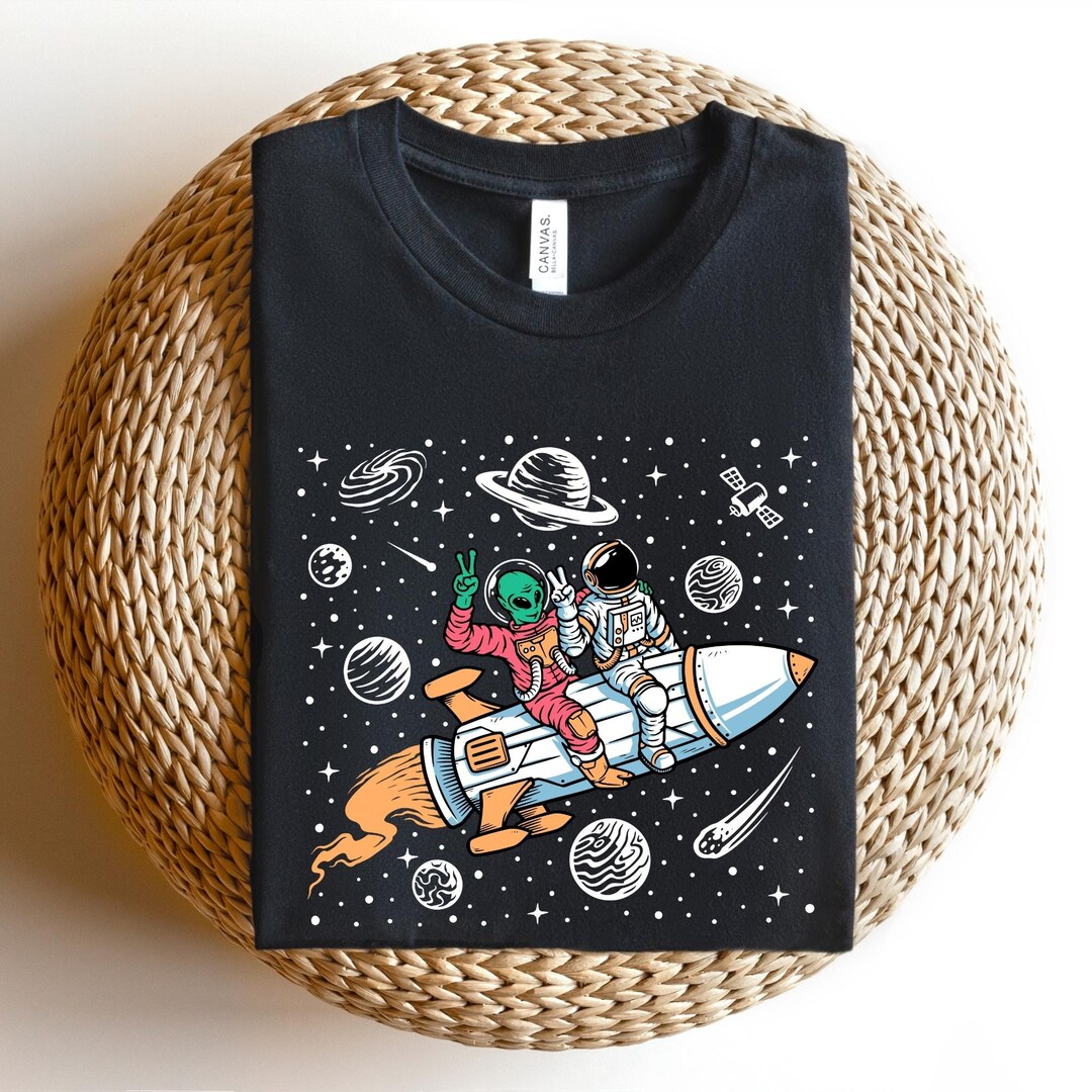 Astronaut & Alien Riding A Rocket Graphic T-shirt Funny Space Shirt ...