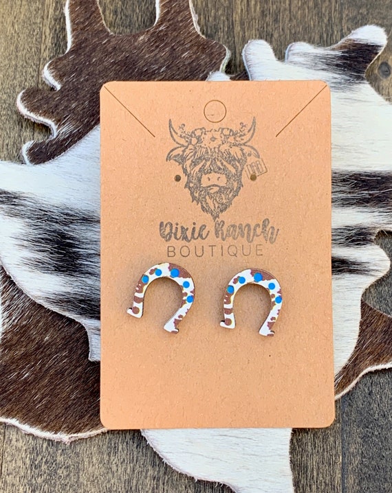 Cowhide stud earrings store
