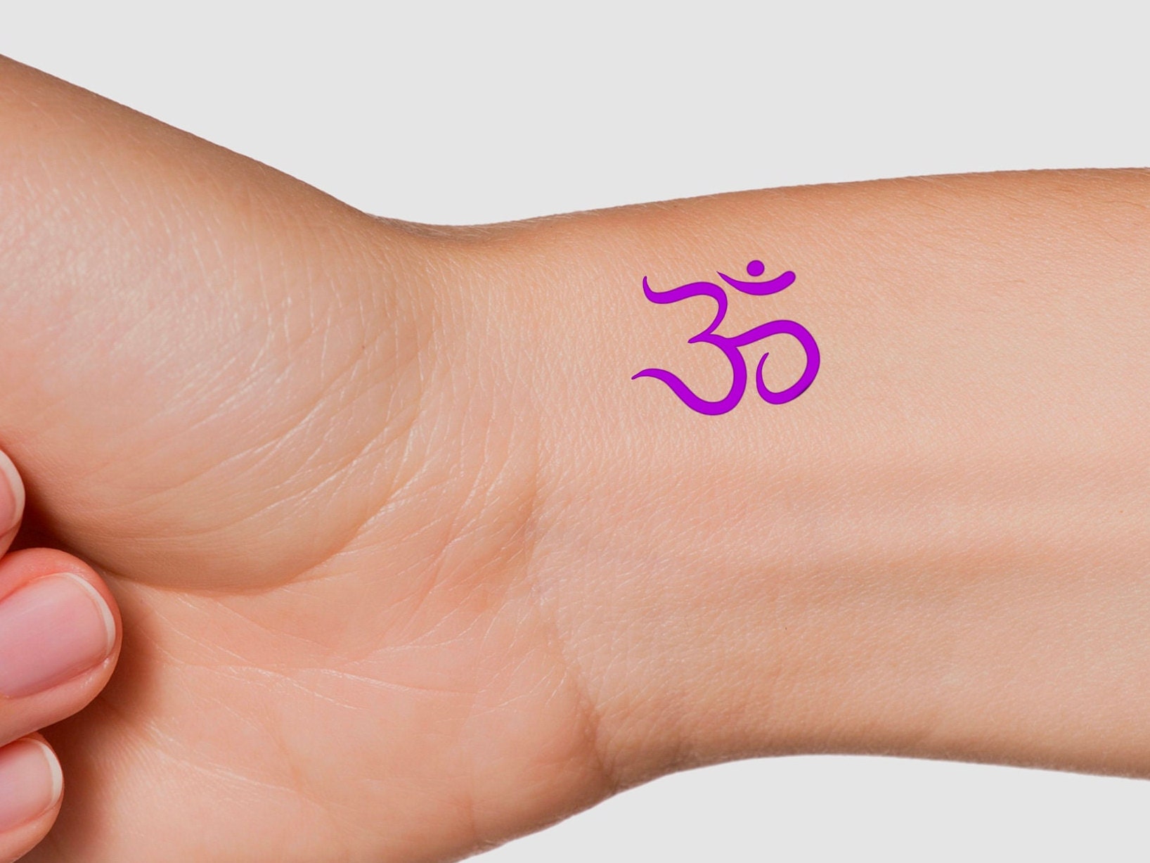 Ohm Symbol Tattoo