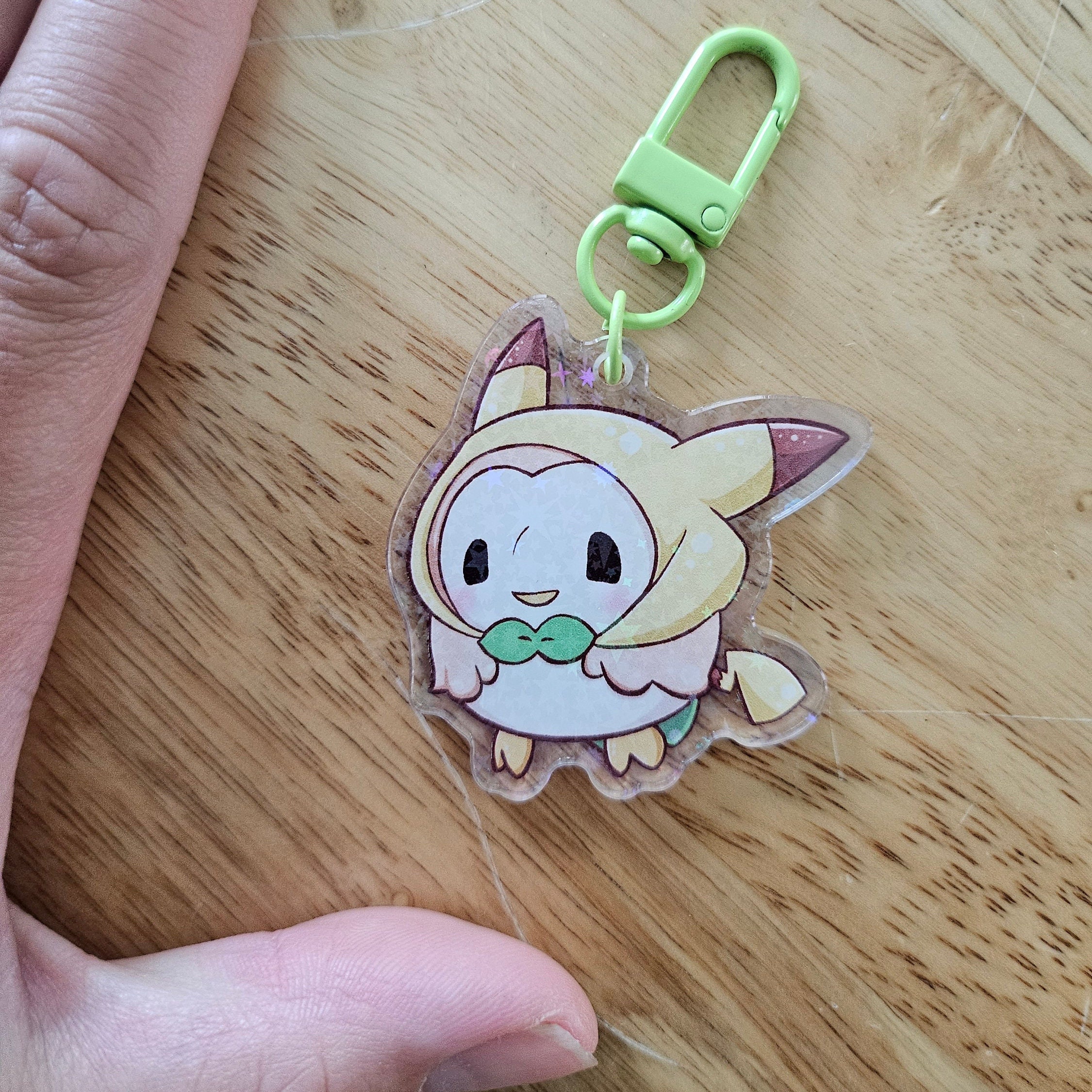 POKEMON Rowlet With Pikachu Hood Holographic Acrylic Keychain - Etsy