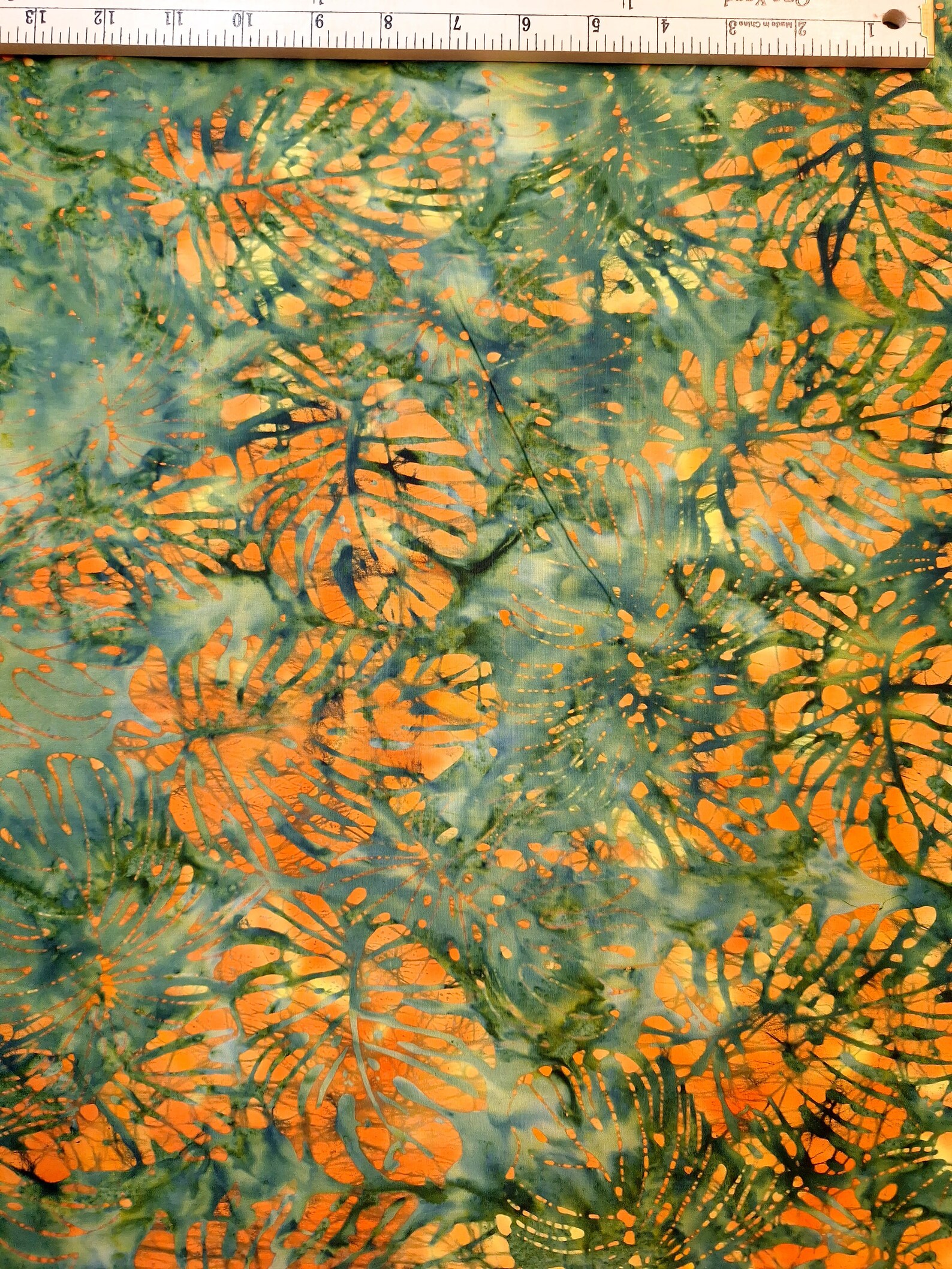 REMNANT Monstera Leaf Green & Orange Batik Fabric Transpacific Fabrics ...