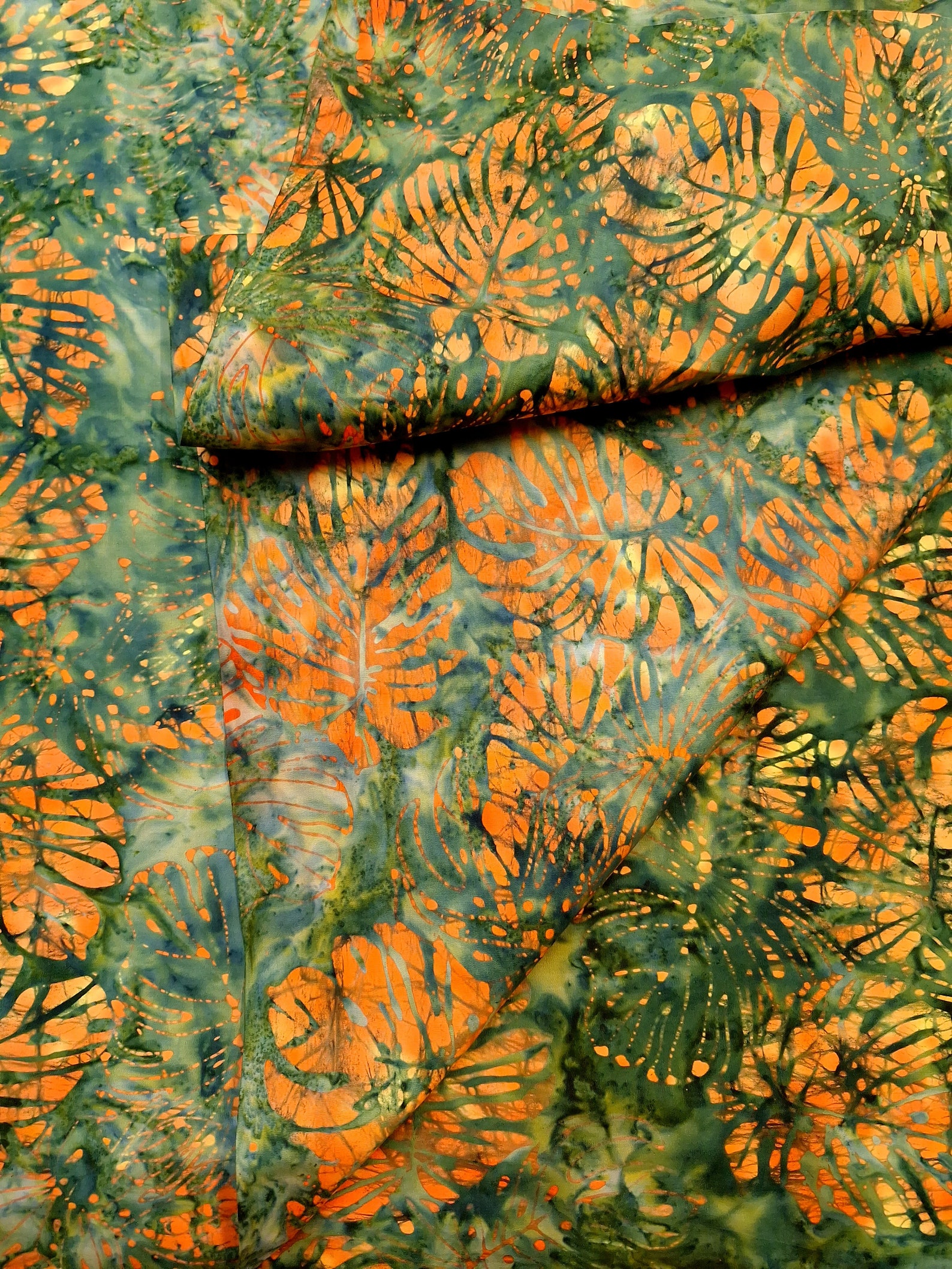 REMNANT Monstera Leaf Green & Orange Batik Fabric Transpacific Fabrics ...