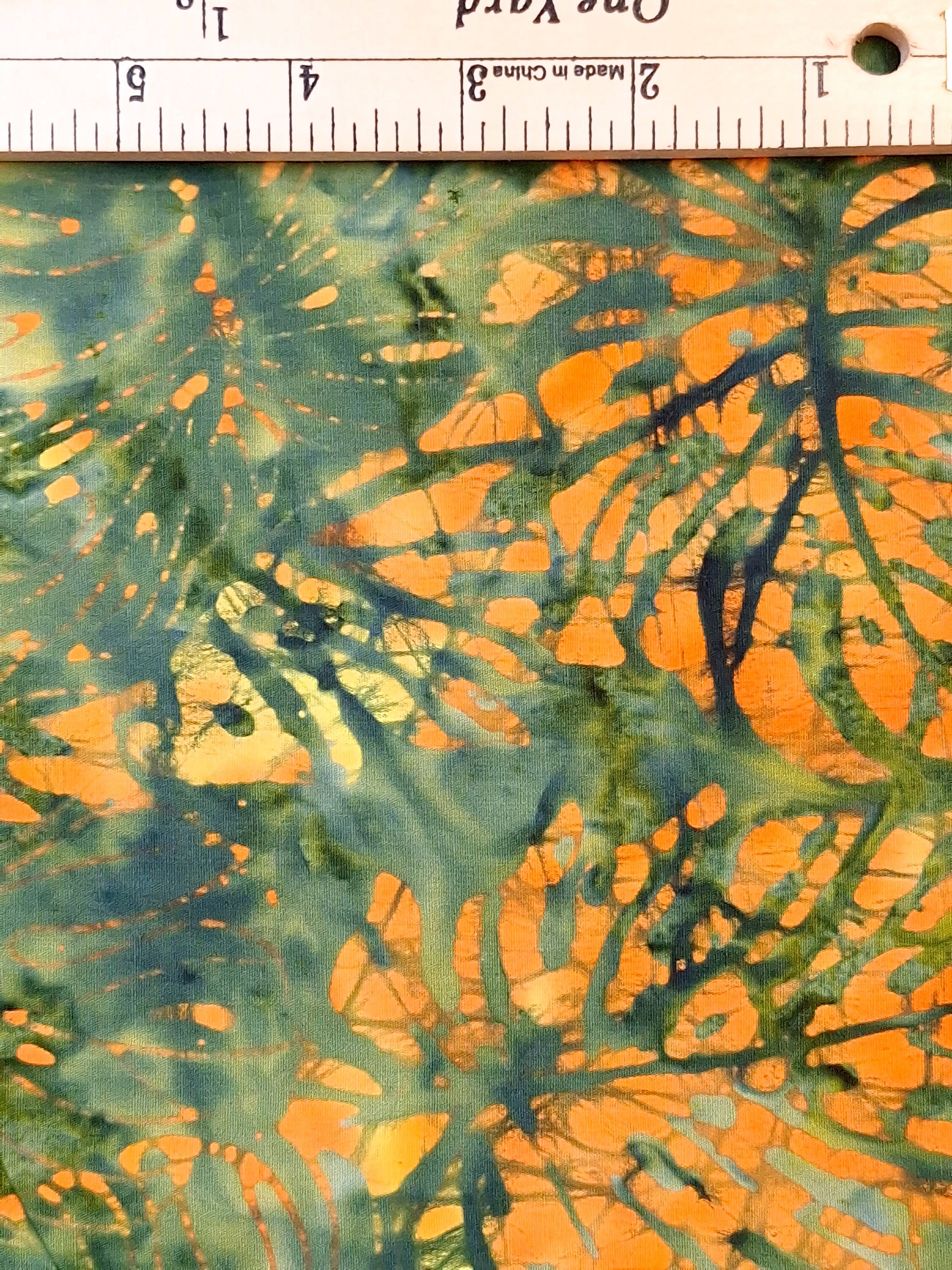 REMNANT Monstera Leaf Green & Orange Batik Fabric Transpacific Fabrics ...